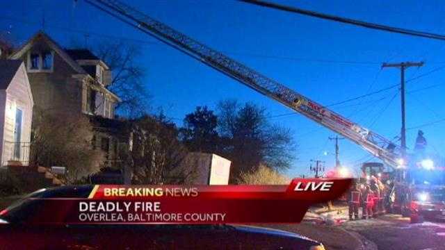 Crews fight hot spots hours after fatal Overlea fire