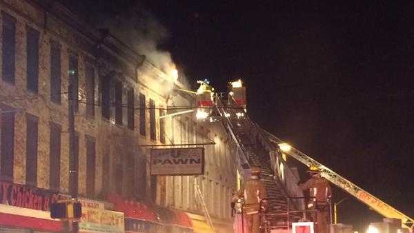Multiple-alarm fire burns in west Baltimore