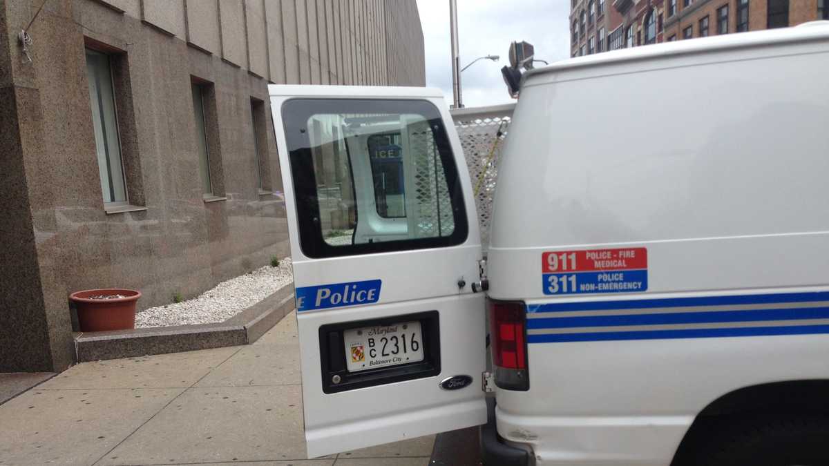 Images: Sign inside police van under investigation