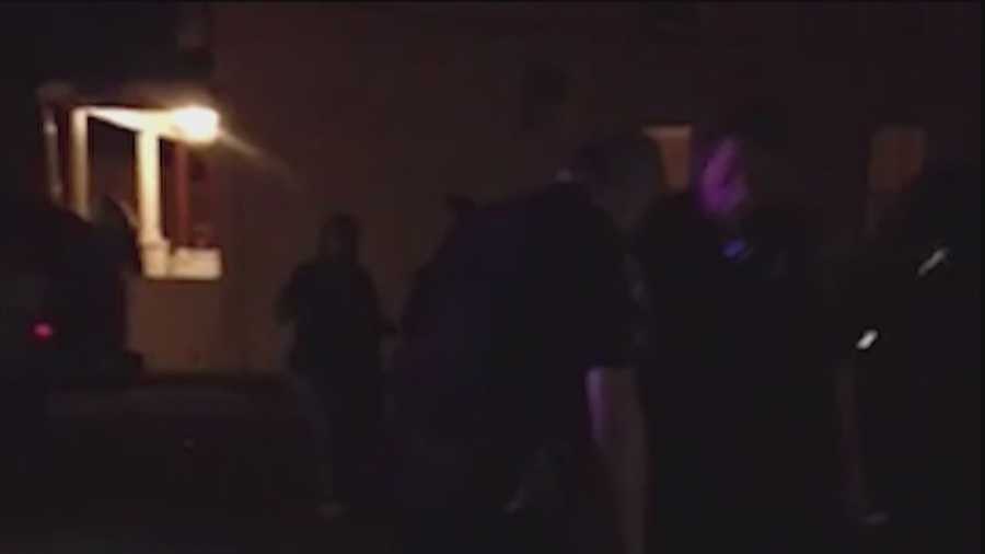 Video Appears To Show Officer Spitting On Man