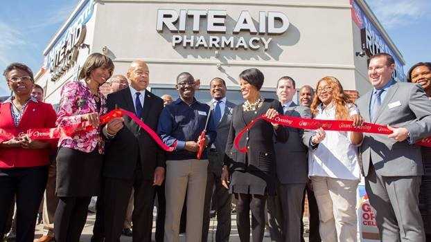 Images: Rite Aid reopens store destroyed during riots