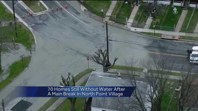 Water main break floods Baltimore County road
