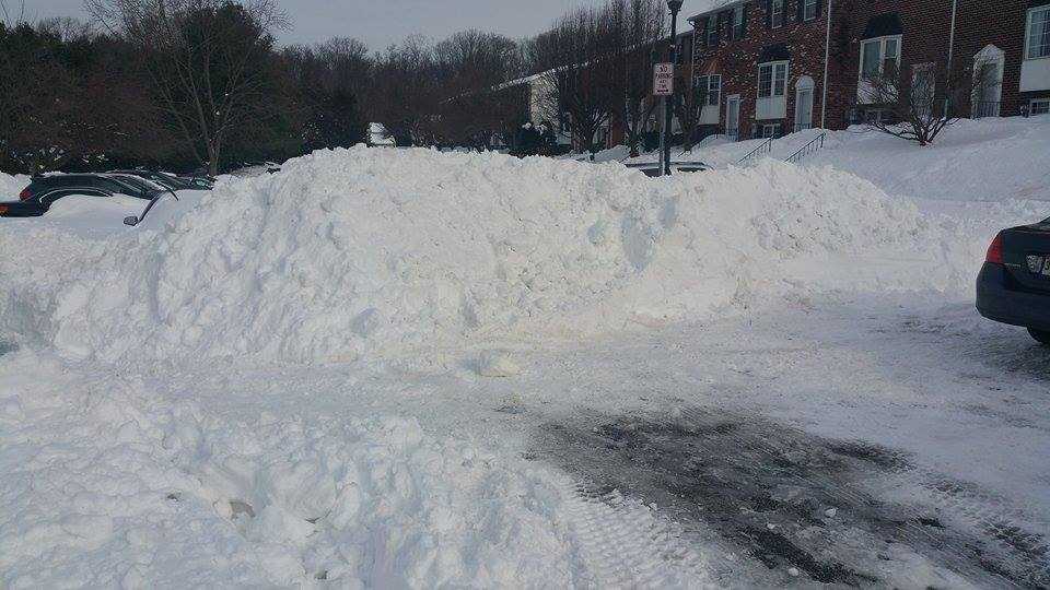 Photos: Massive snow wall blocks neighborhood