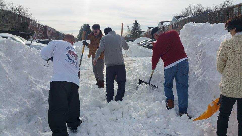 Photos: Massive snow wall blocks neighborhood