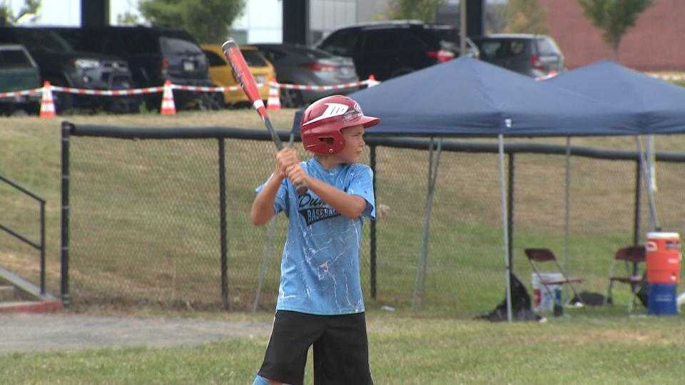 Baltimore County police host youth baseball camp