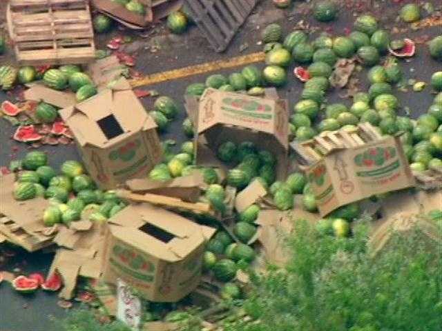 Images: Watermelon truck overturns, dumps load