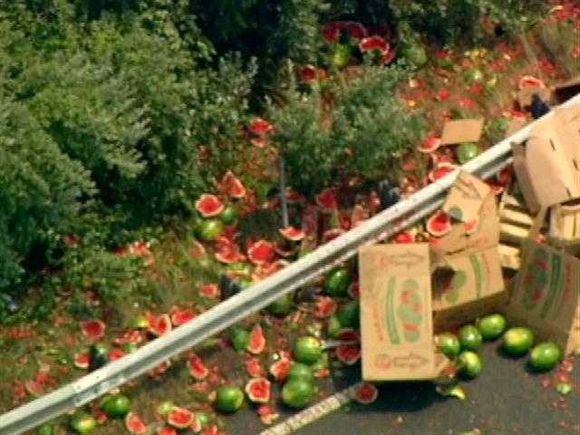 Images: Watermelon truck overturns, dumps load