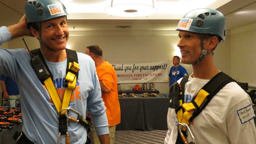 Images: Anthony and David rappel down Hub building