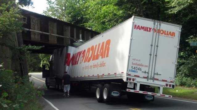 Tractor trailer fails to clear bridge