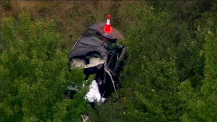 Photos: Driver killed, crosses into oncoming traffic