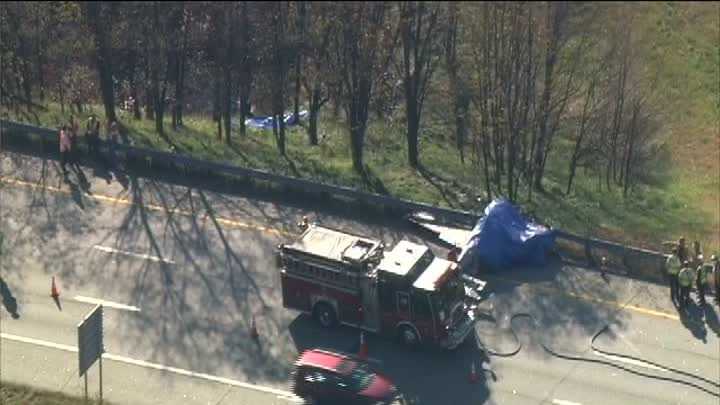 In Photos: Plane crashes on New Hampshire highway