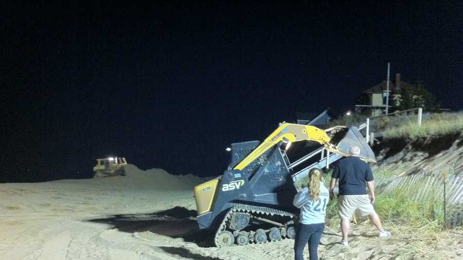 Residents rush to save homes before storm