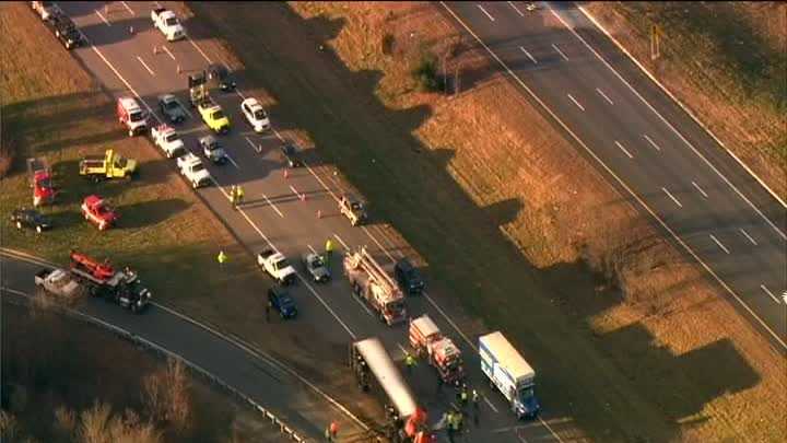 Truck carrying maple syrup flips over on Interstate 495