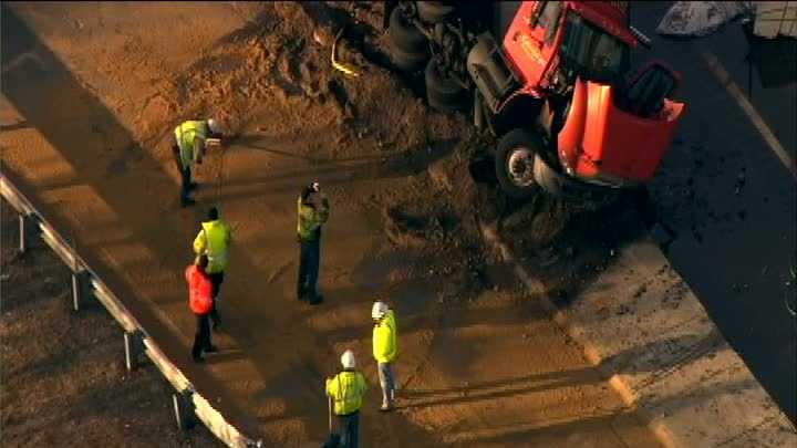 Truck carrying maple syrup flips over on Interstate 495