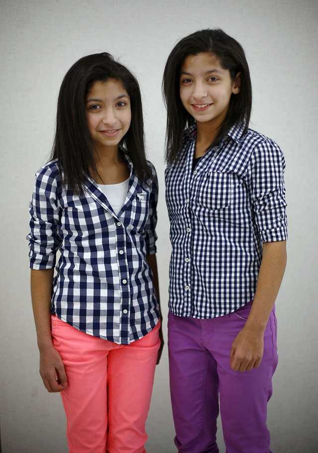 Seeing double? 16 set of twins in one 7th grade; triplets, too!