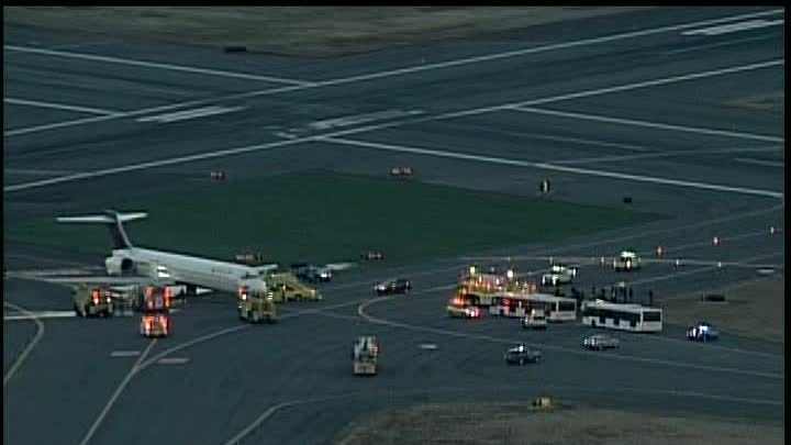 Photos: Passengers evacuated from Logan plane on runway