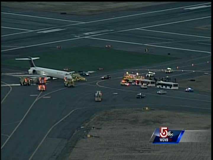 Photos: Passengers evacuated from Logan plane on runway