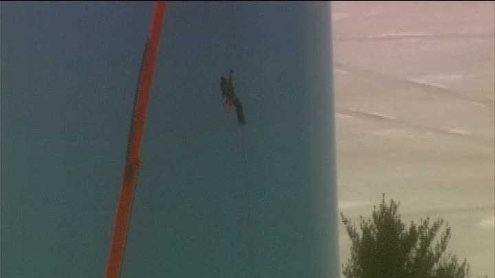 Frame-by-frame: workers rescued from water tower