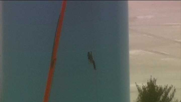 Frame-by-frame: workers rescued from water tower