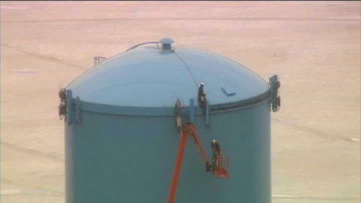 Frame-by-frame: workers rescued from water tower