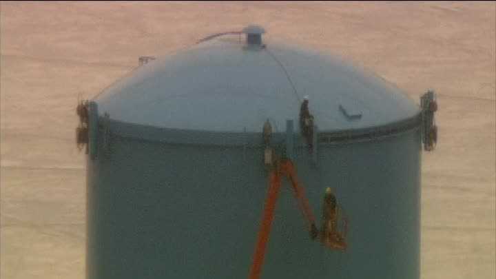 Frame-by-frame: workers rescued from water tower