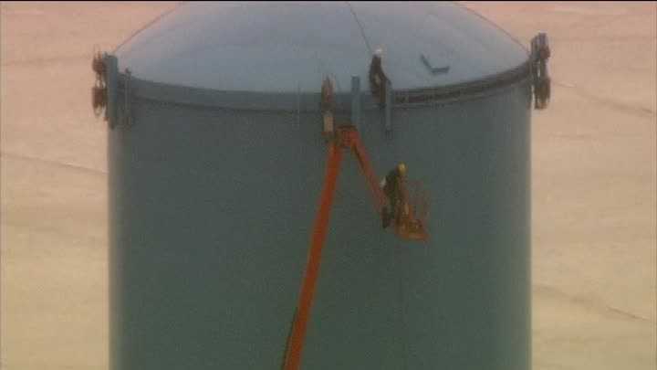 Frame-by-frame: workers rescued from water tower