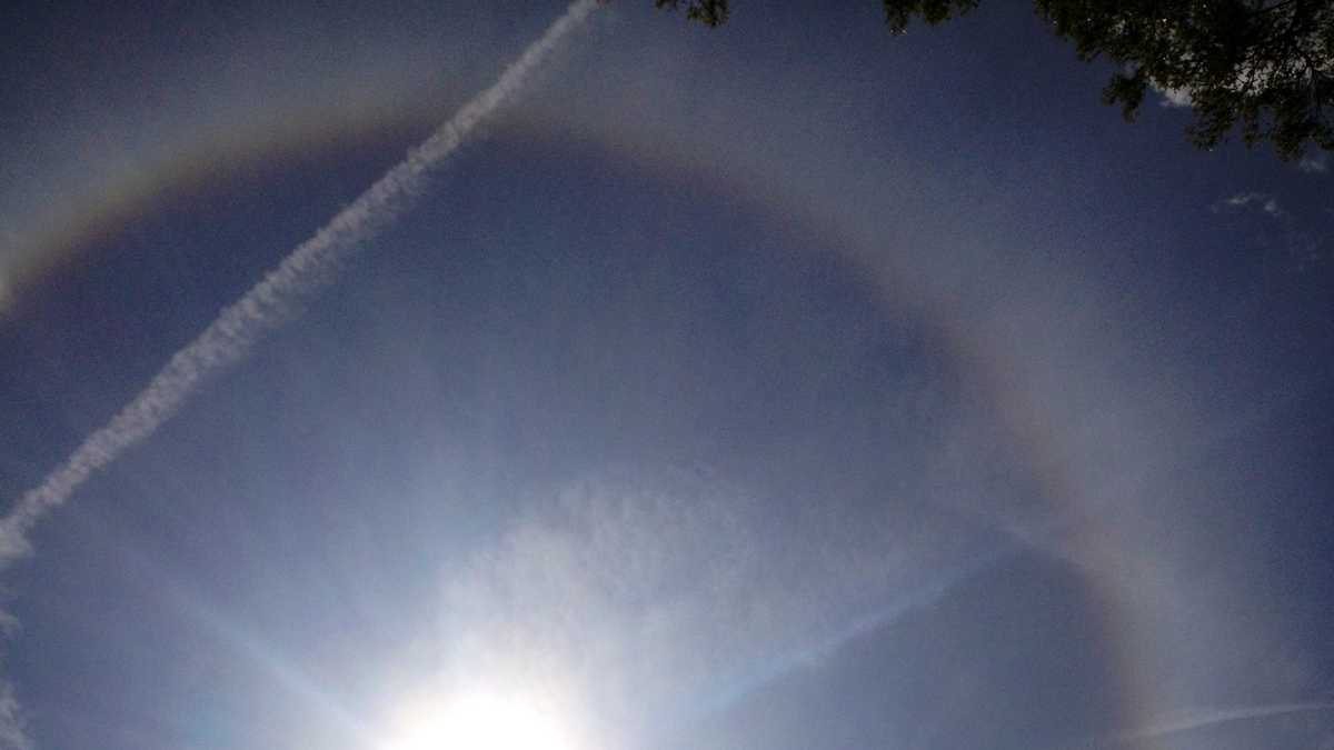Rainbow around sun draws attention in Mass.