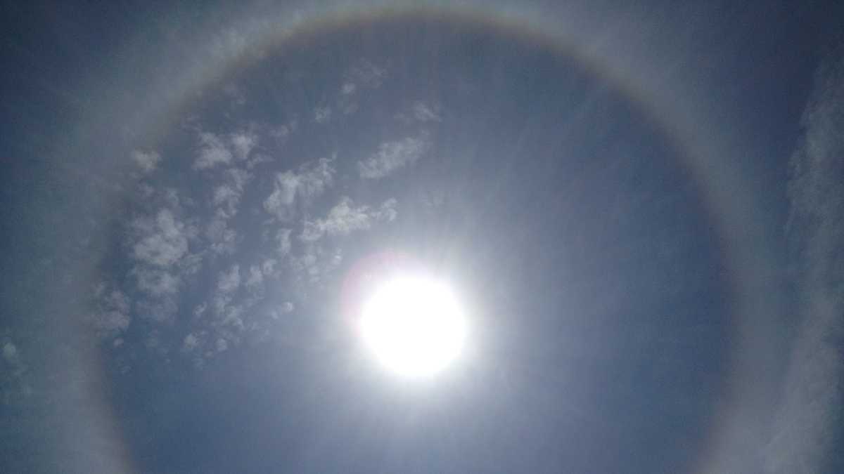 Rainbow around sun draws attention in Mass.