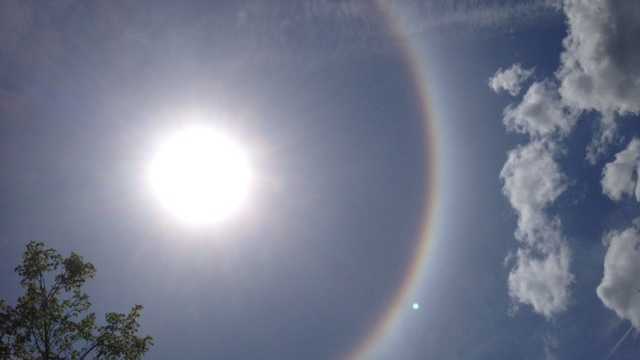 Rainbow around sun draws attention in Mass.