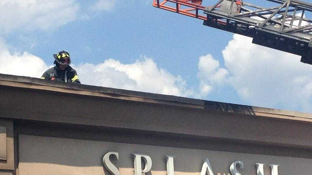 Fire destroys cars inside parking lot