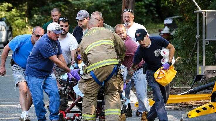 Photos: Worker in bucket truck shocked