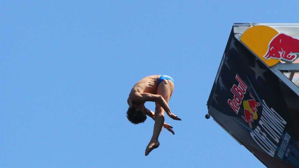 Divers jump from 90 feet above Boston Harbor
