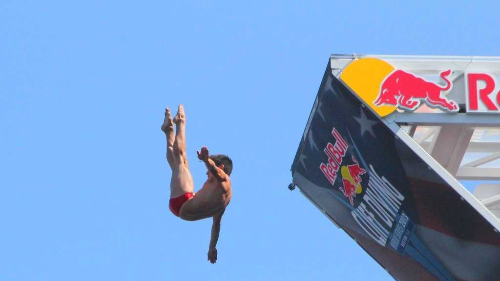 Divers jump from 90 feet above Boston Harbor