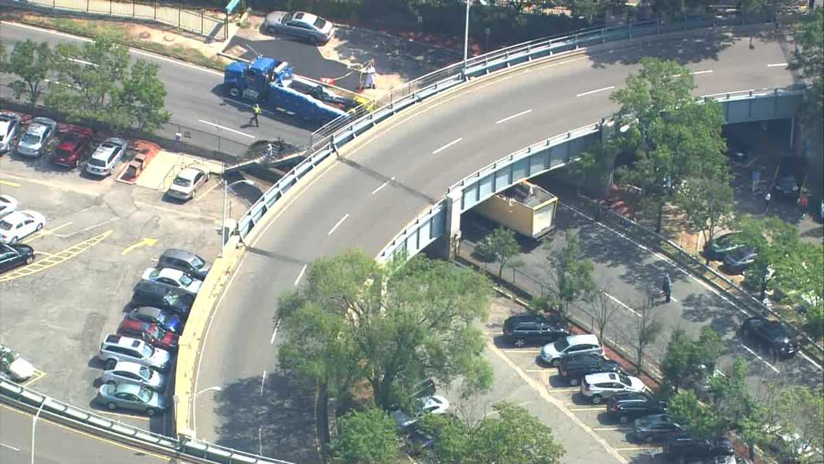 Truck stuck under Storrow Drive bridge