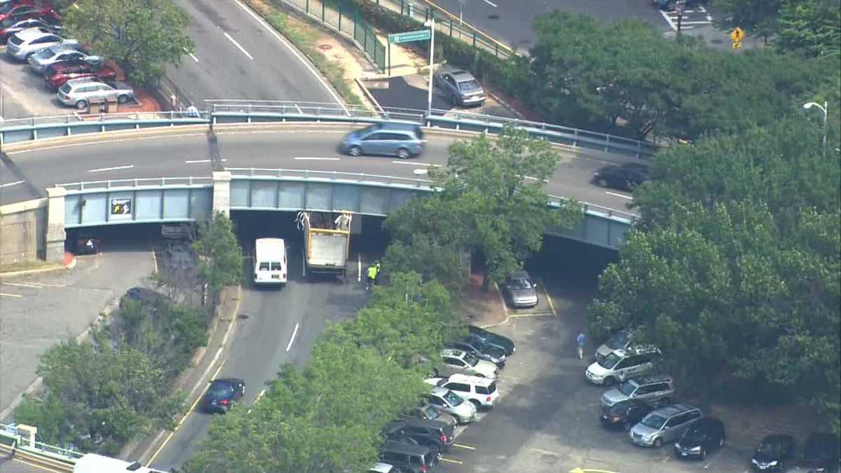 Truck stuck under Storrow Drive bridge