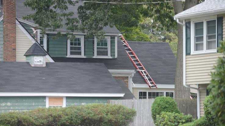 Man dies after fall from roof