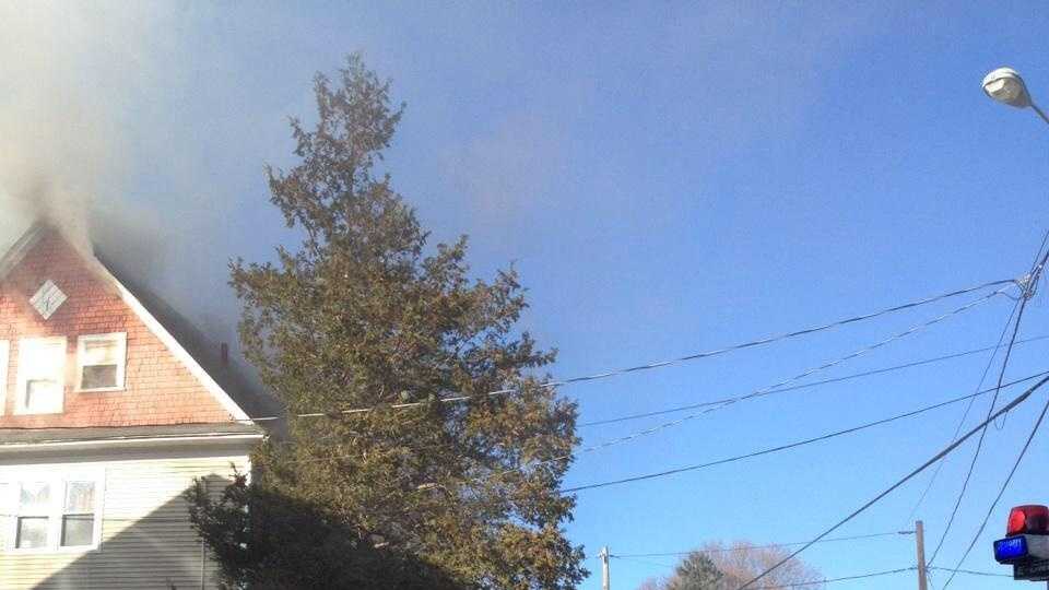 Photos: Fire rips through Lawrence home