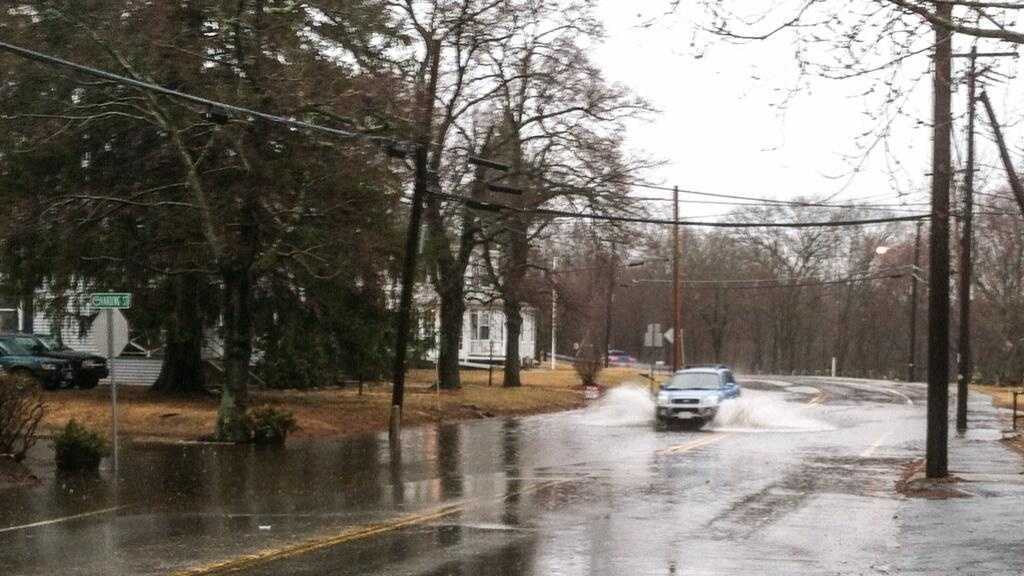 Photos: Torrential rain floods roads, strands drivers