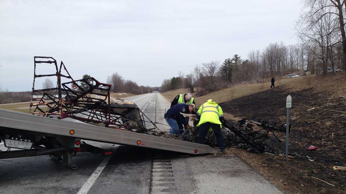 Photos: Plane crashes on I-89, pilot parachutes out