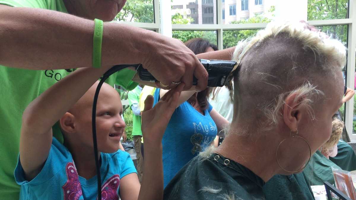 Photos: Moms shave heads for kids with cancer