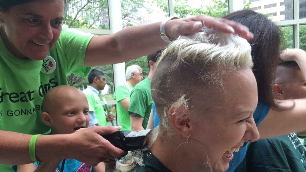 Photos: Moms shave heads for kids with cancer