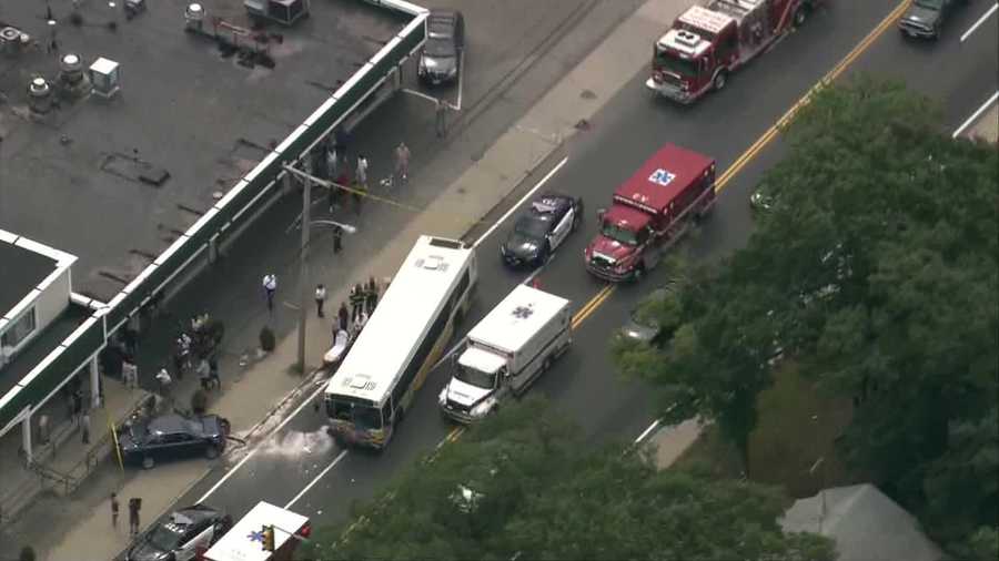 Car collides with MBTA bus
