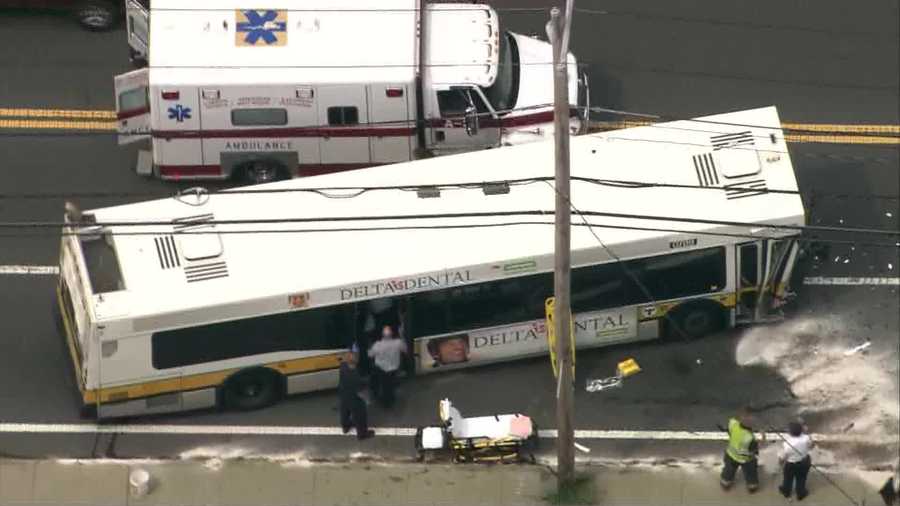 Car collides with MBTA bus