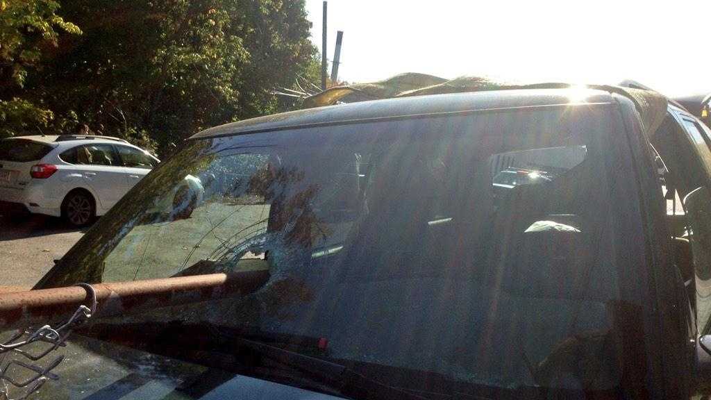Pole crashes through windshield narrowly missing driver