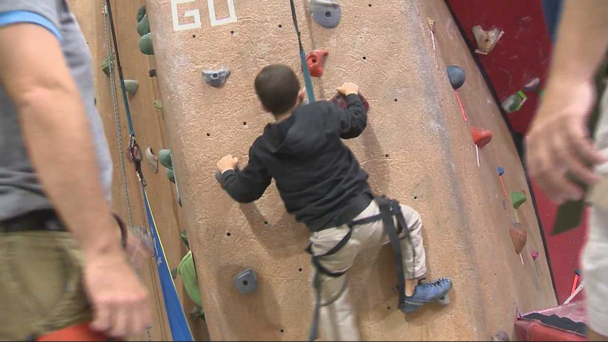 Firefighters help young burn victims reach new heights