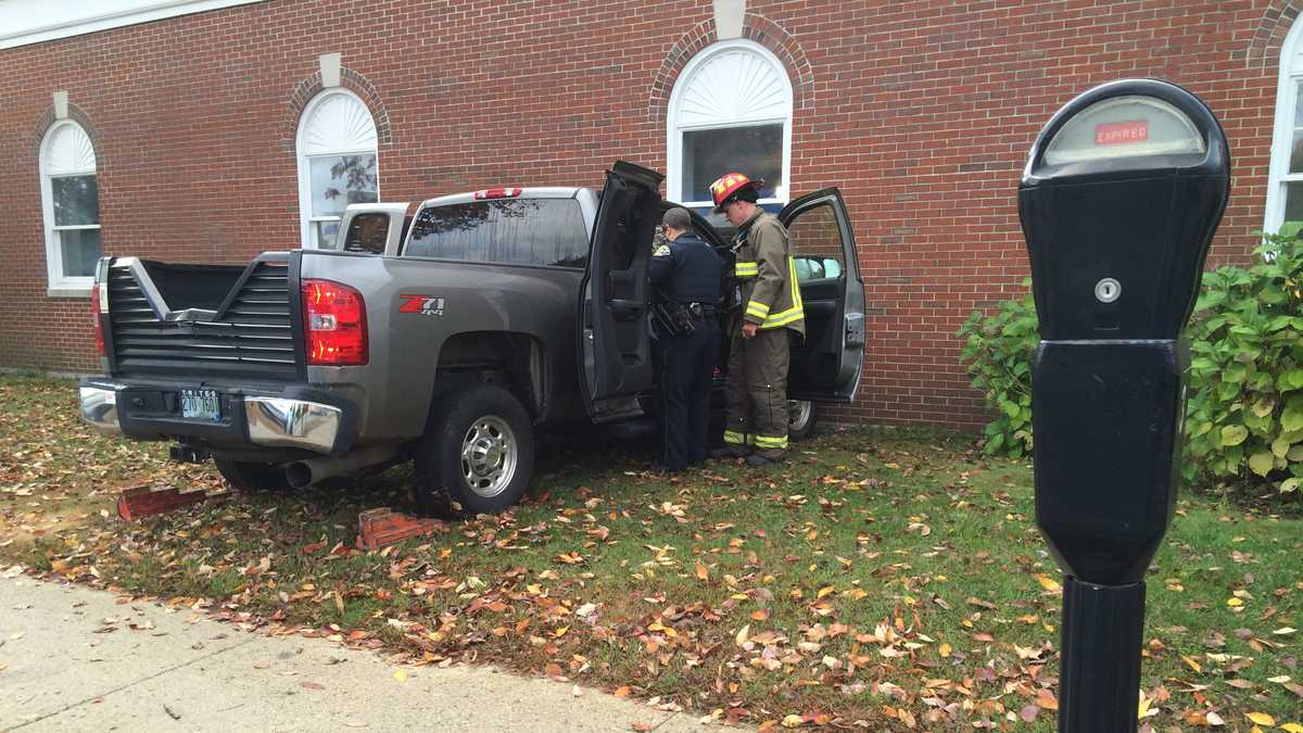 Truck crashes into post office after driver has medical episode