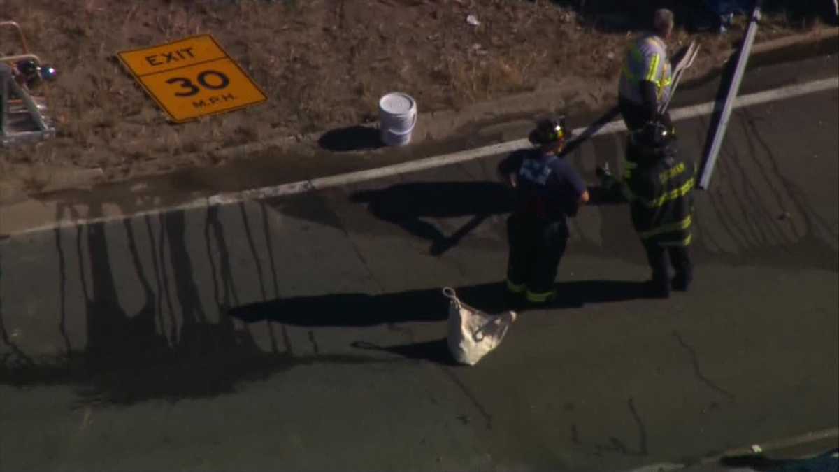 Portable toilet truck crashes on highway exit ramp