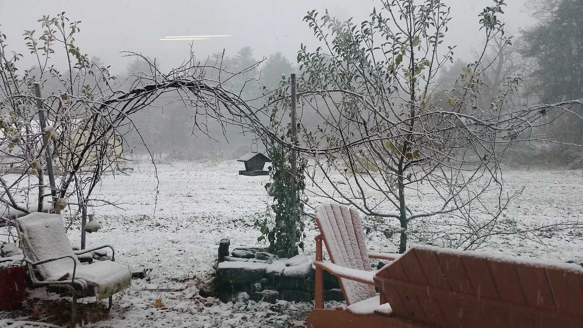 Photos: Storm brings first snow to much of Maine