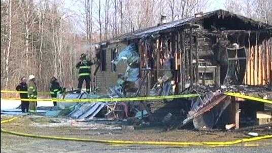 Photos: Four killed in northern Maine fire