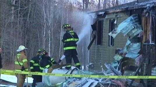 Photos: Four killed in northern Maine fire